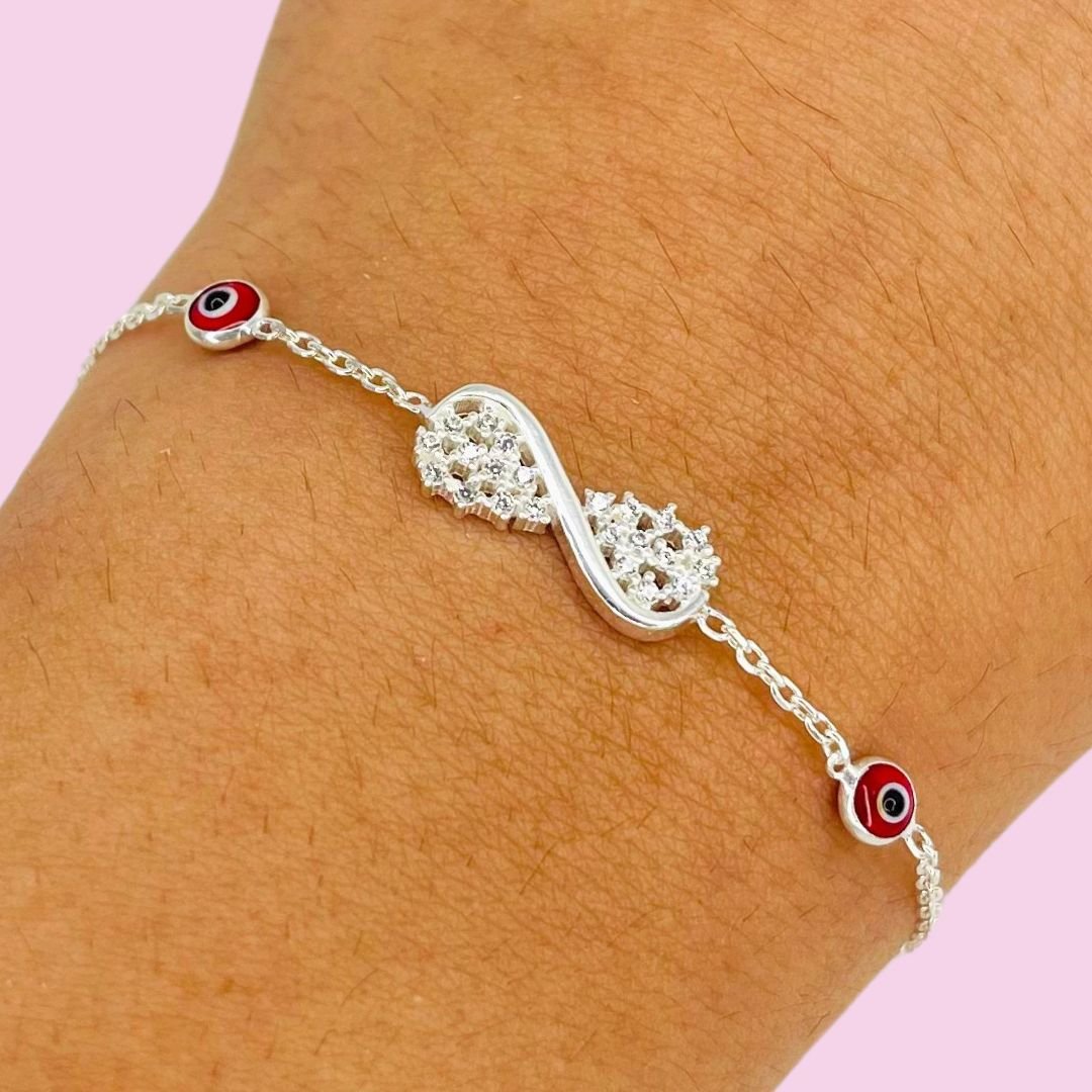 Pulsera Infinito relleno con cubic y ojitos protectores Plata Italiana